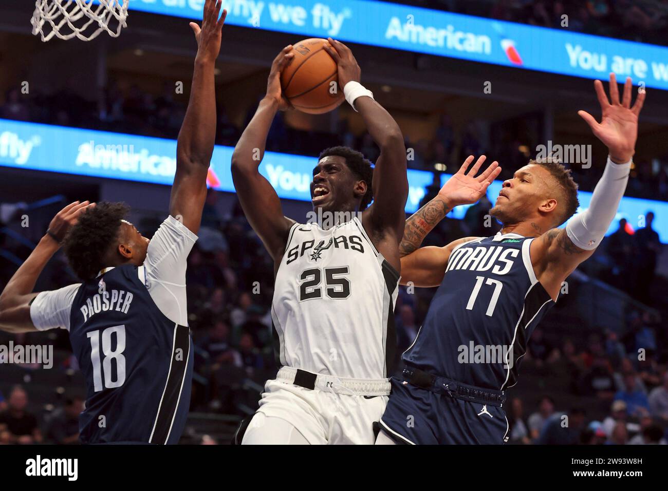 Dallas Mavericks forward Olivier-Maxence Prosper (18) and guard Dexter Dennis (17) guard San ...