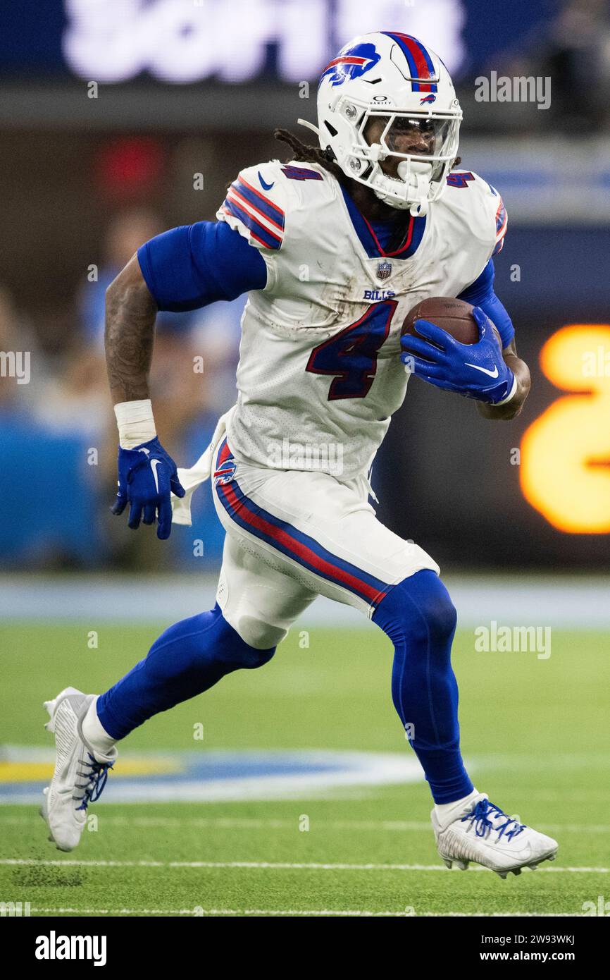 Buffalo Bills running back James Cook (4) runs with the ball during an ...