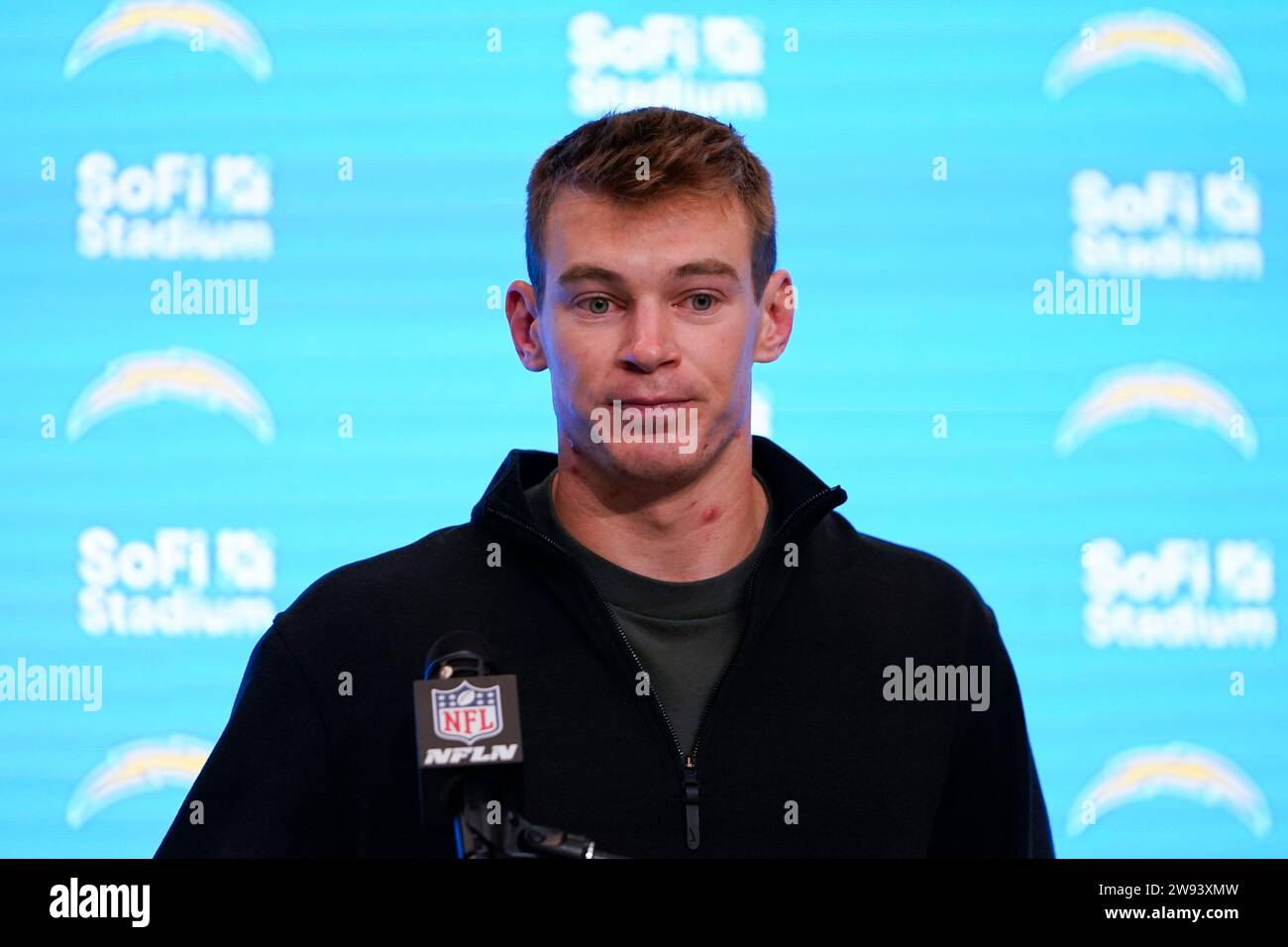 Los Angeles Chargers quarterback Easton Stick fields questions after an ...