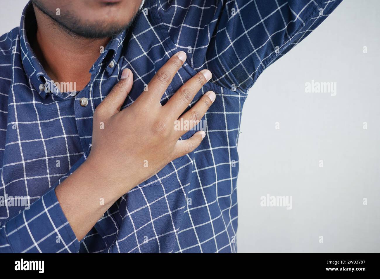Smelling clothes armpit hi-res stock photography and images - Alamy