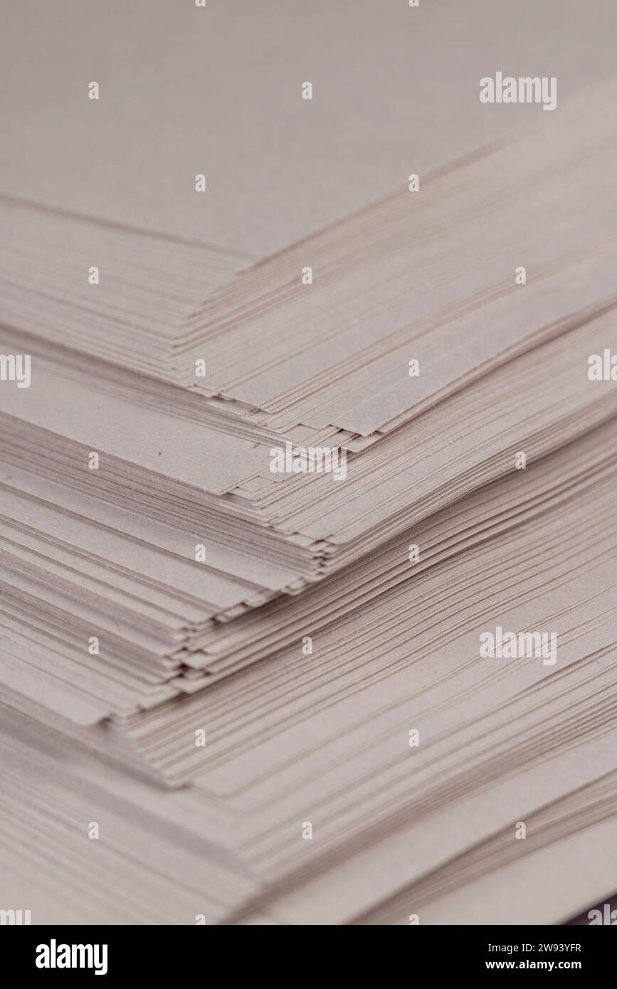 grey low-quality thin paper from recycled waste, paper used for writing ...