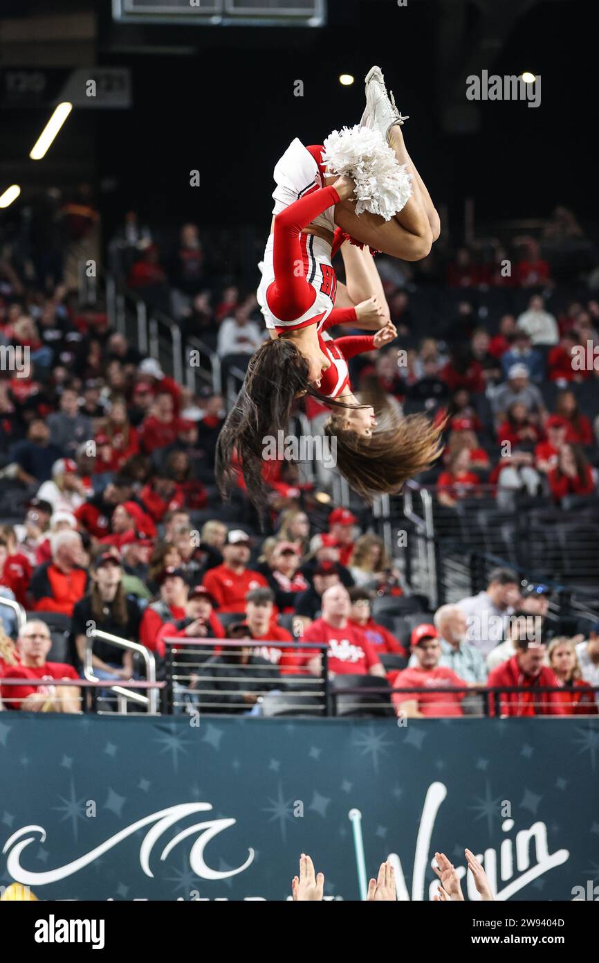 Las Vegas, NV, USA. 23rd Dec, 2023. Utah Utes cheerleaders perform ...