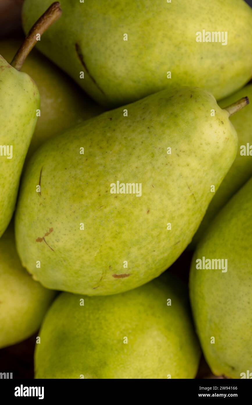 whole ripe and juicy green pears, delicious pears washed and ready for ...