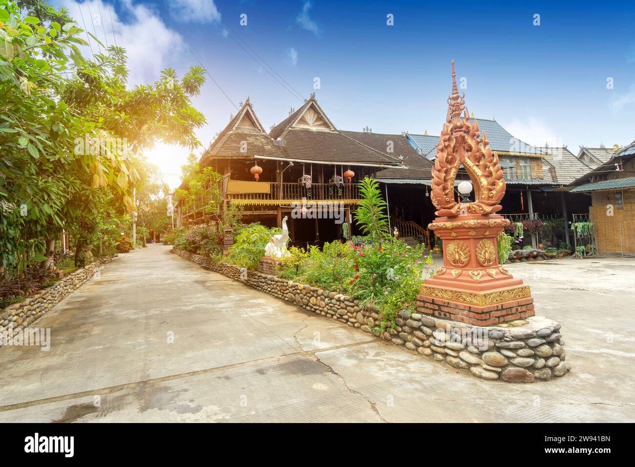 Dai people's village, Xishuangbanna, Yunnan, China Stock Photo - Alamy