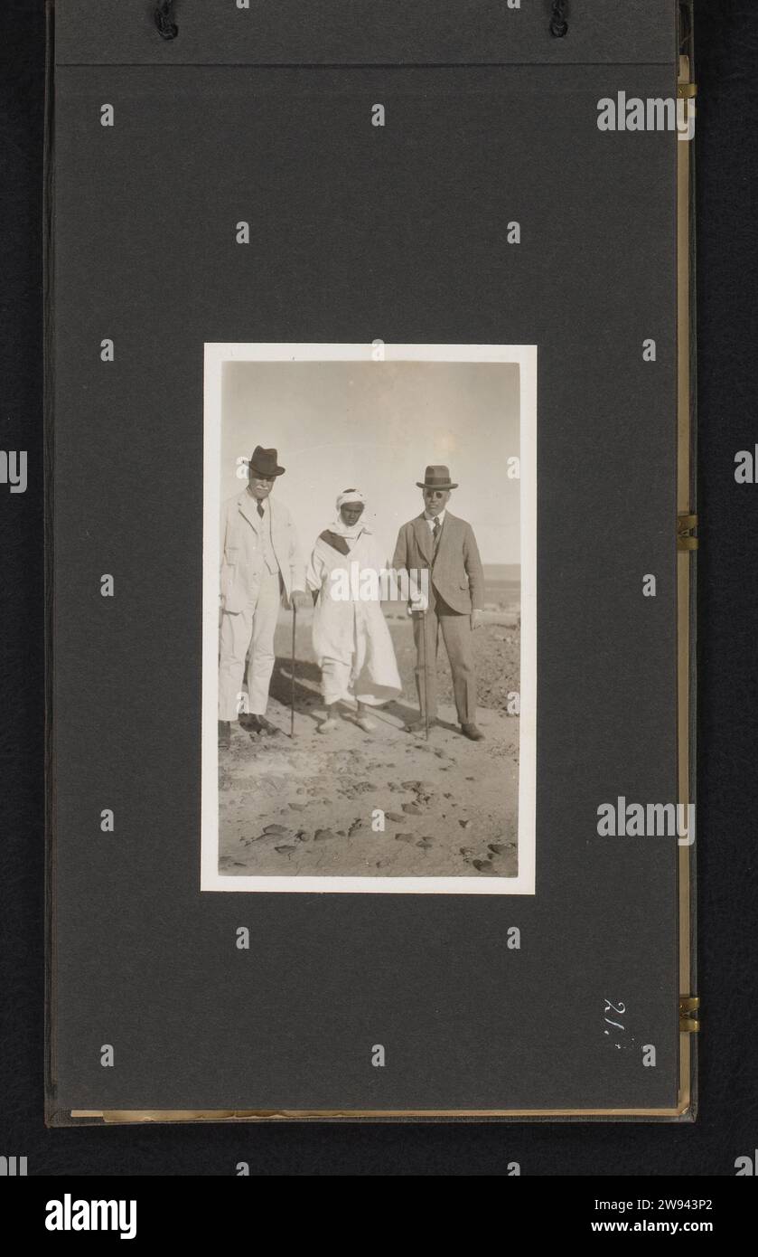 Two European men and an Algerian man in the desert of Béni Ounif, 1927 ...