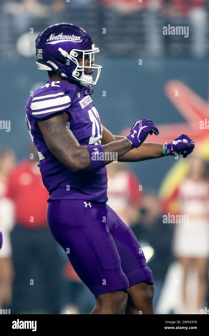 Las Vegas, NV, USA. 23rd Dec, 2023. Northwestern Wildcats defensive ...