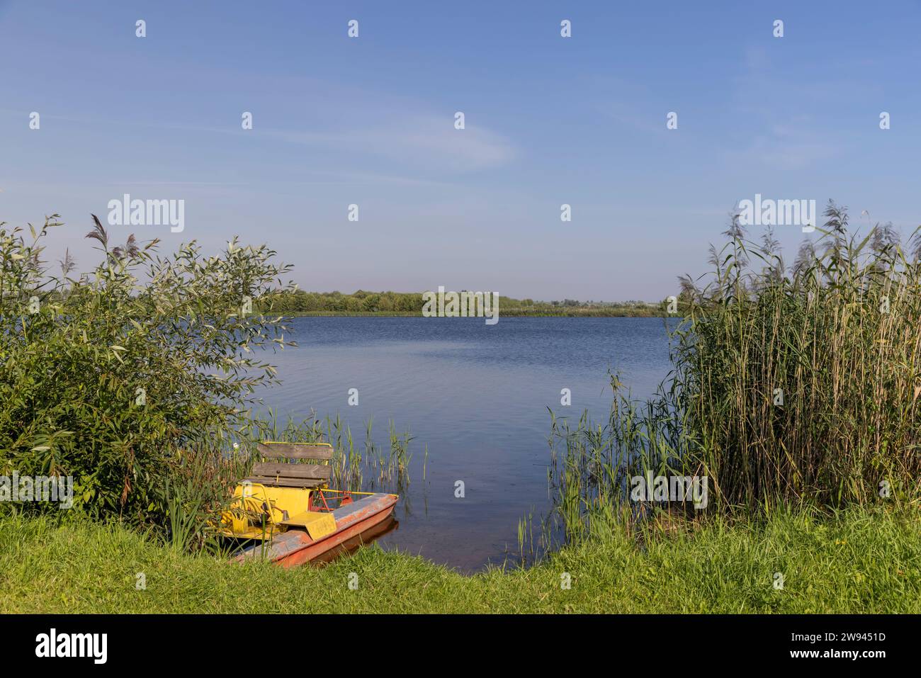 old catamaran on the lake shore, one old catamaran for walking on the ...