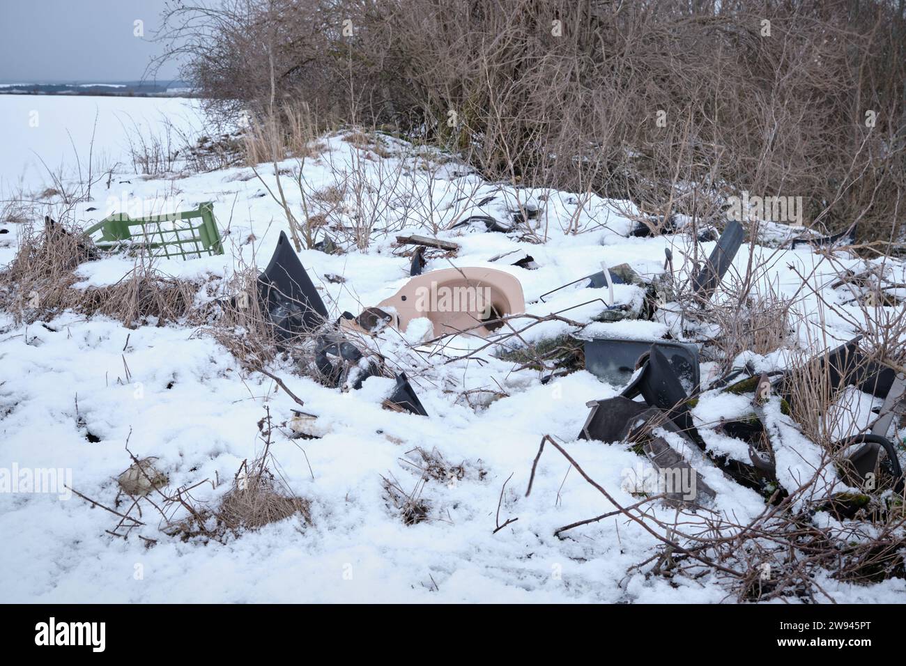 Illegal dump of communal waste from construction in forest area close ...