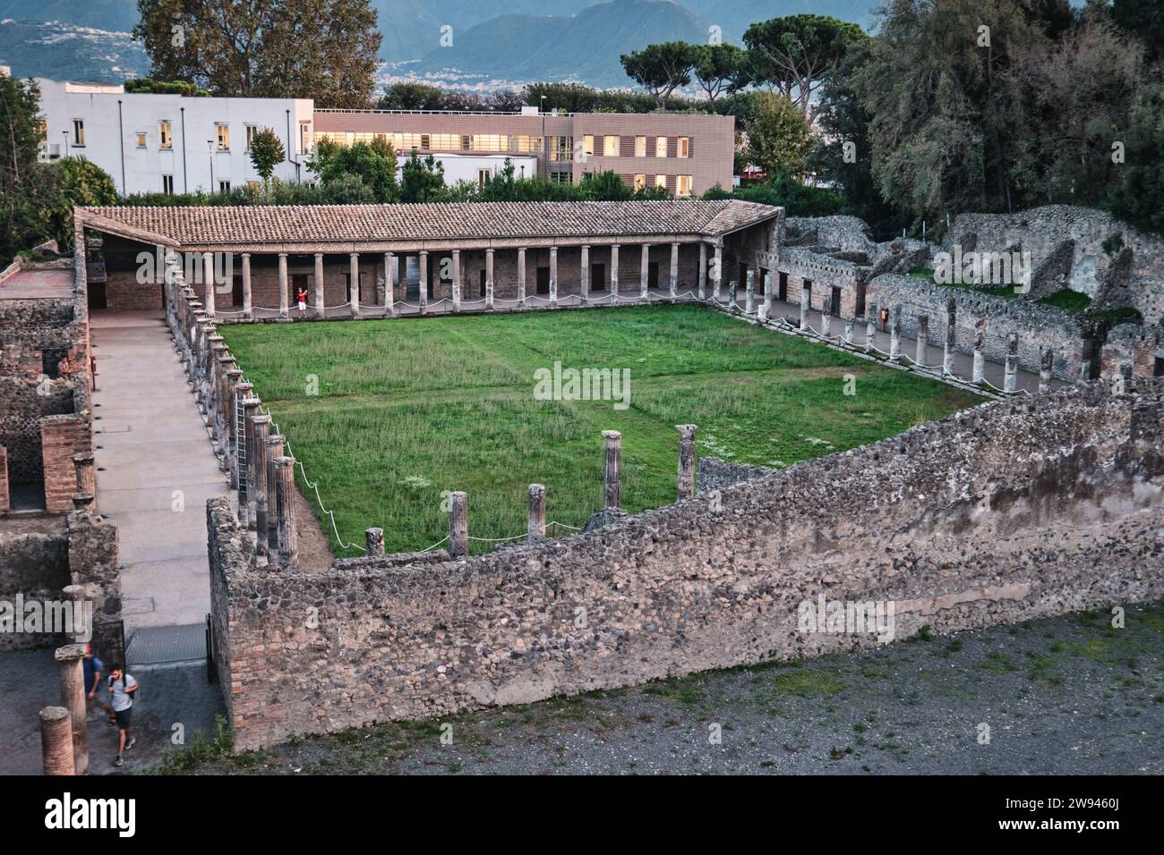 Naples, Italy - November 8 2023: Archaeological Park of Pompeii. Quadriporticus of the theaters ...