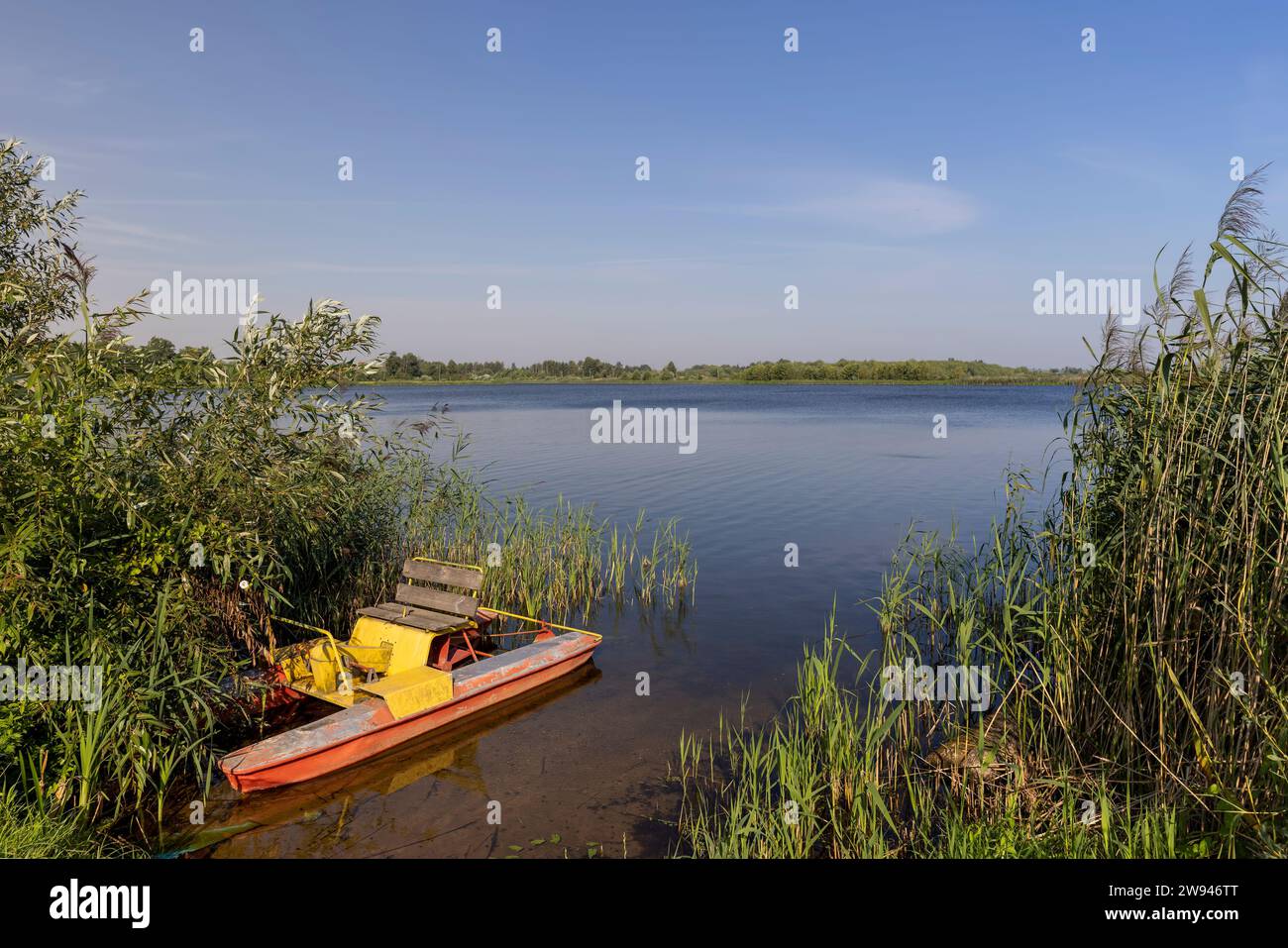 old catamaran on the lake shore, one old catamaran for walking on the ...
