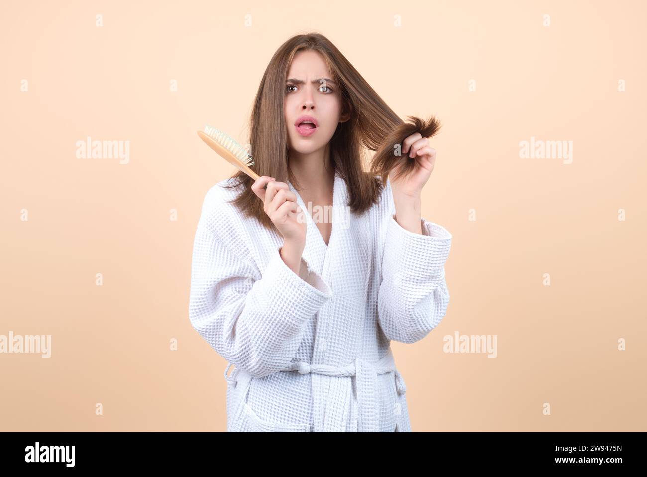 Messy hair. Brunette woman with messed hairs. Girl with bad frizzy hair ...