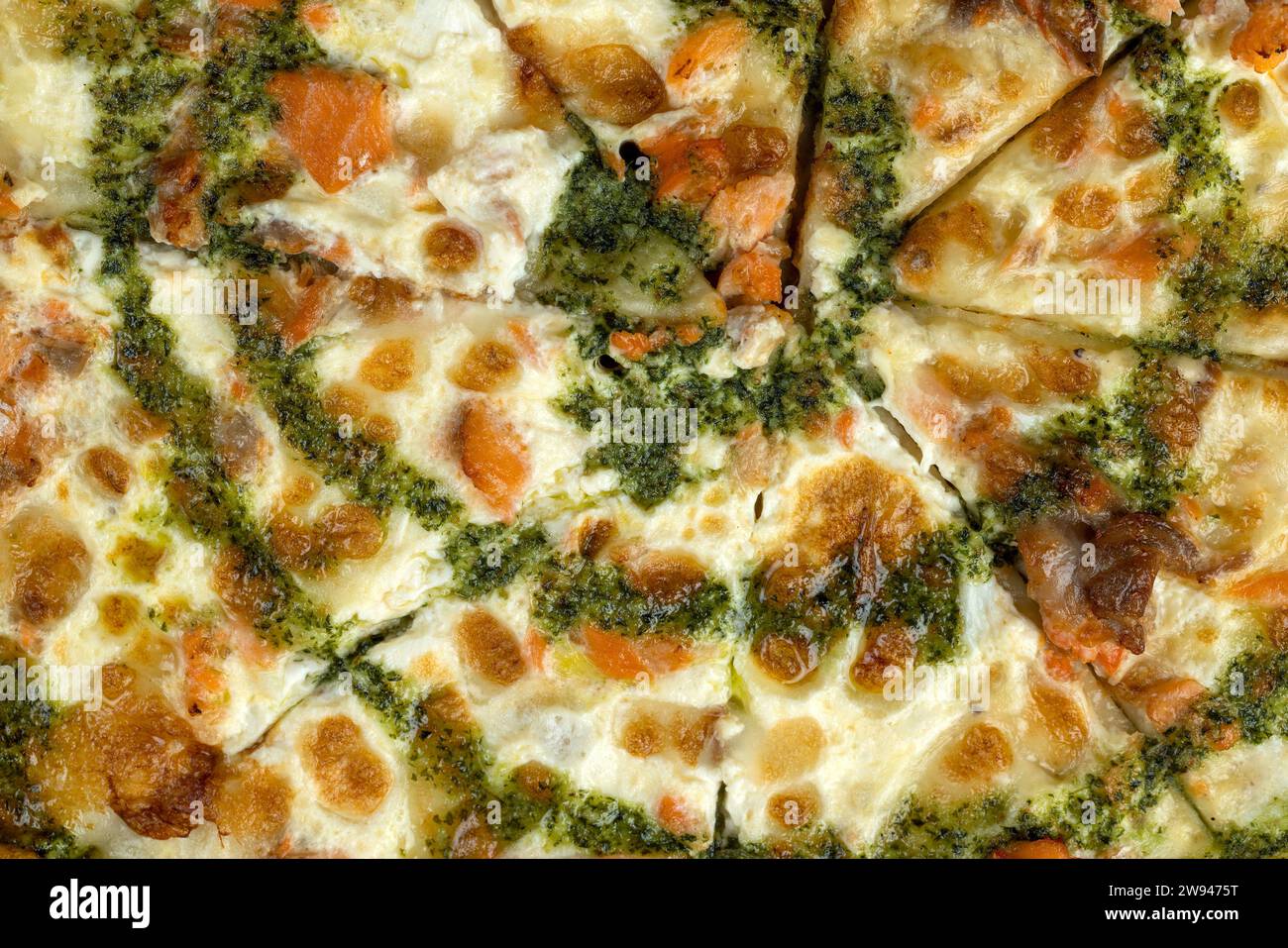 pizza with red trout fish and green sauce, delicious pizza with fish ...