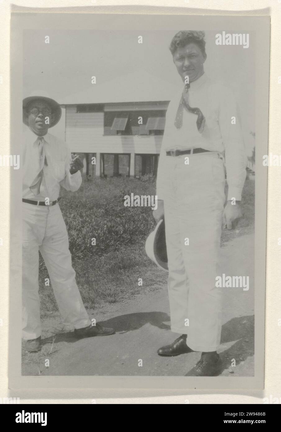 Two men in Moengo, 1929 - 1930 photograph Suriname photographic support ...