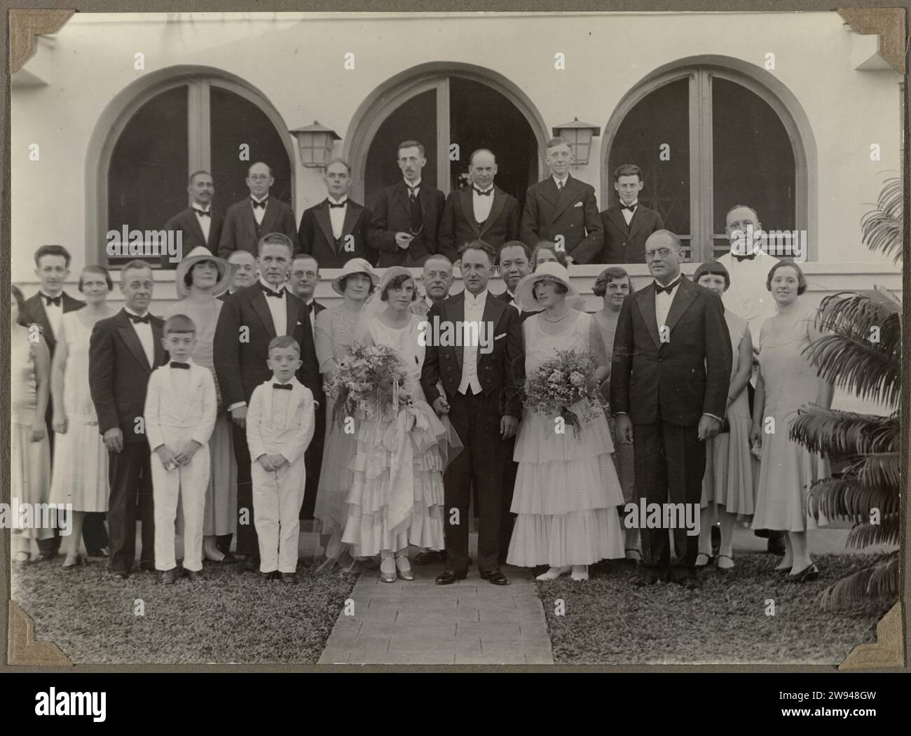 Wedding, 1925 - 1927 photograph Group photo on a wedding between the guests Edith Jetten. Photo ...