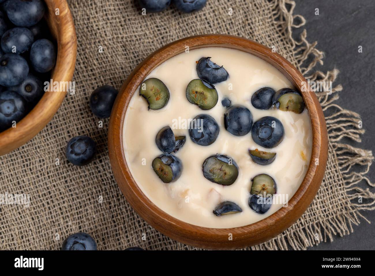sliced blueberries for berry-flavored yogurt, ripe blueberries and ...