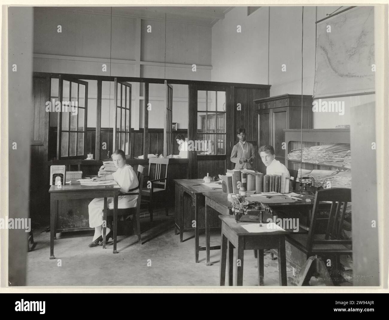 Editorial office, 1921 photograph Face in the editorial office of the ...
