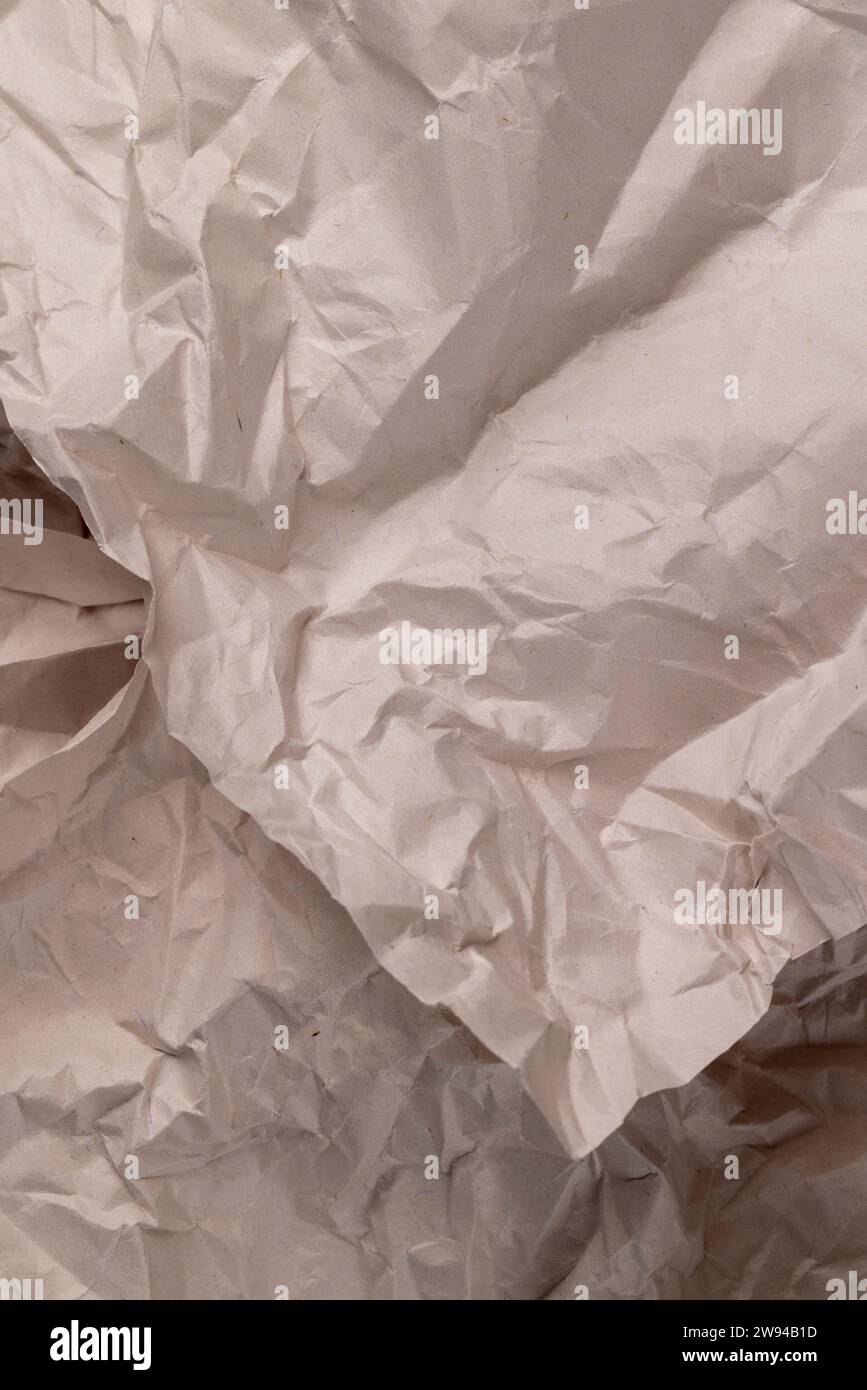 gray low-quality crumpled paper from recycled waste paper , crumpled ...