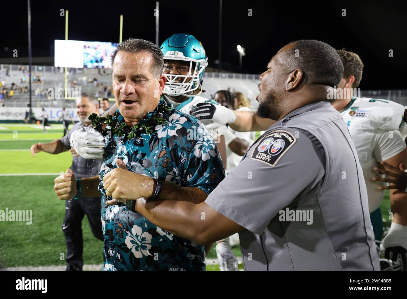Coastal Carolina head coach Tim Beck, left, reacts acer having sports ...