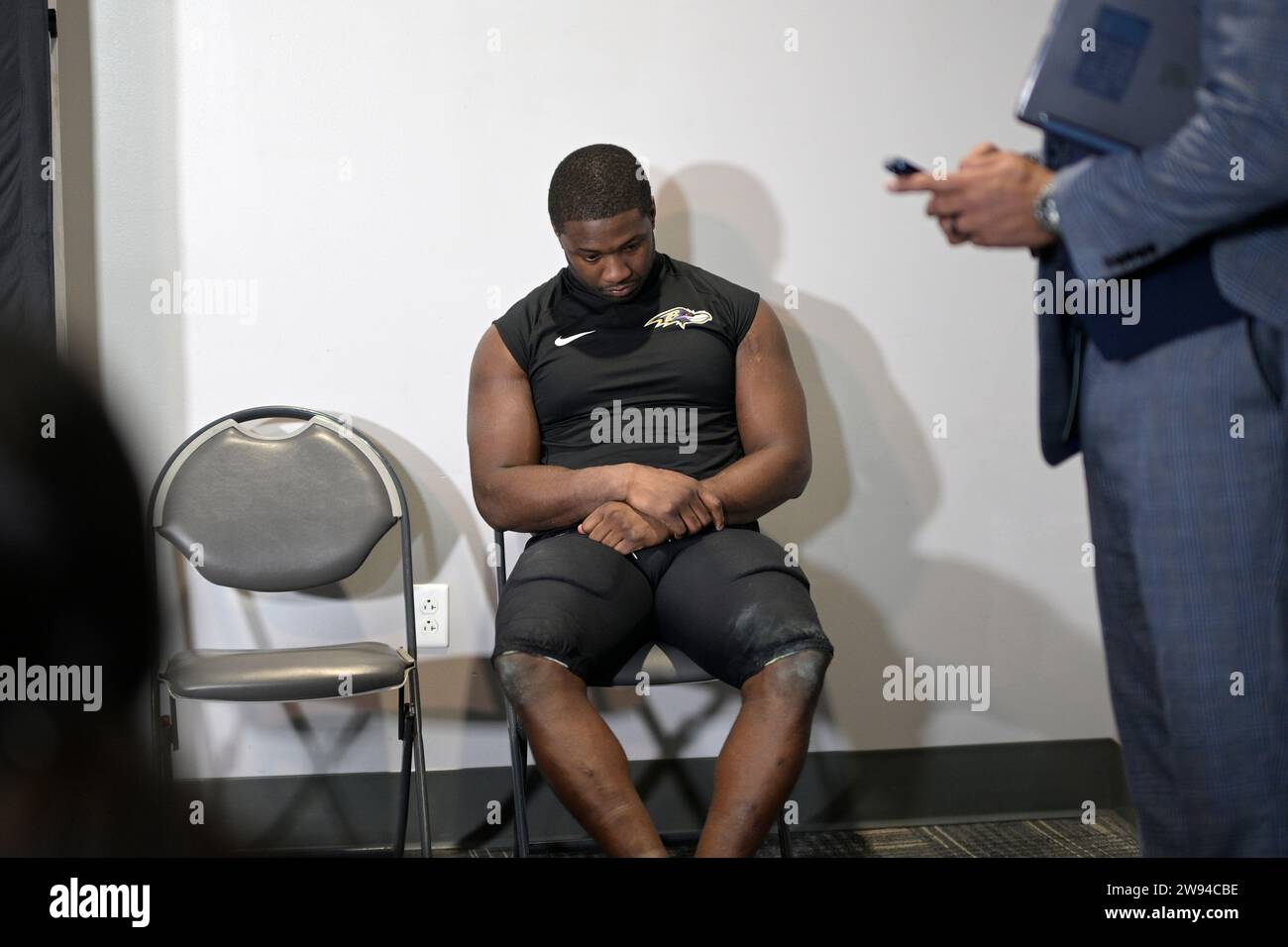 Baltimore Ravens linebacker Roquan Smith listens as quarterback Lamar ...