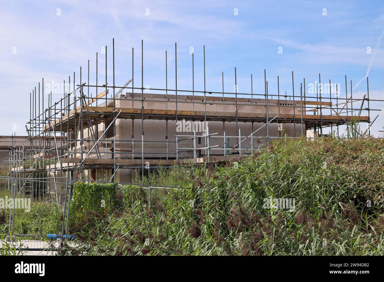 New construction of a house in Esse Zoom with scaffold and isolation in ...