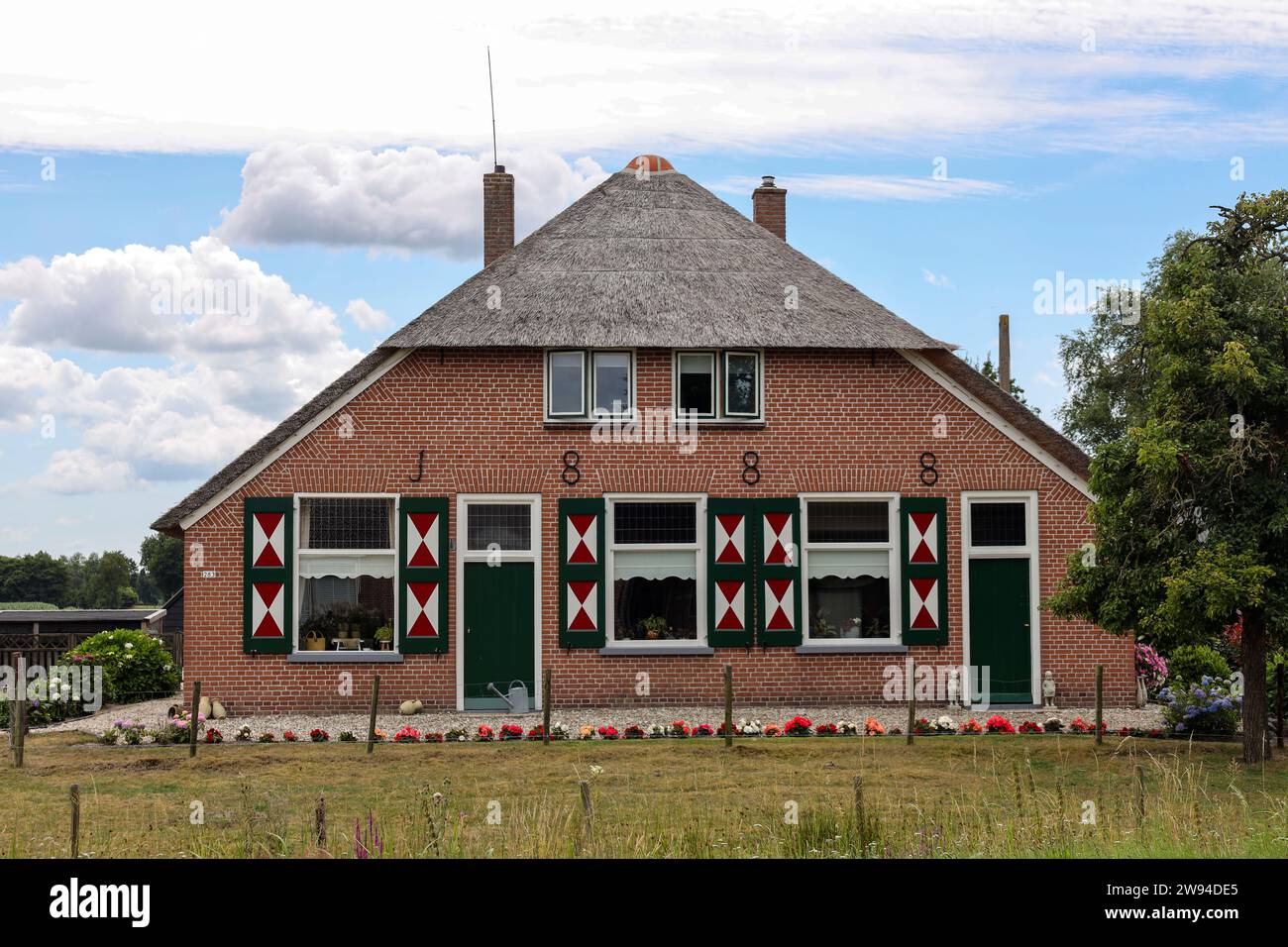 old but renovated farm house at the Zuiderzeestraat in Wezep ...