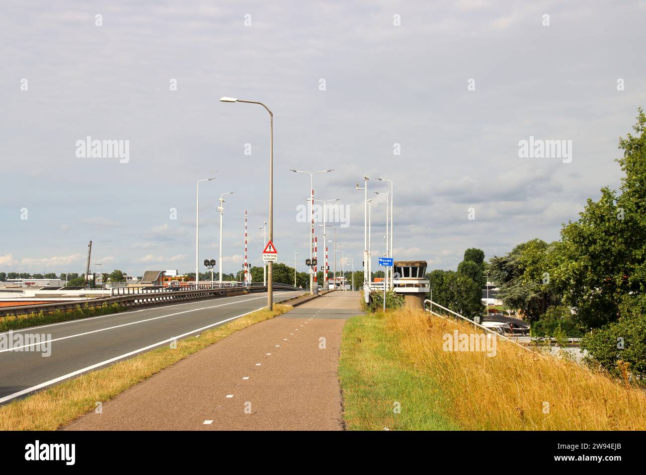 Bascule bridge over the Gouda river called Coenecoopbrug in Waddinxveen ...