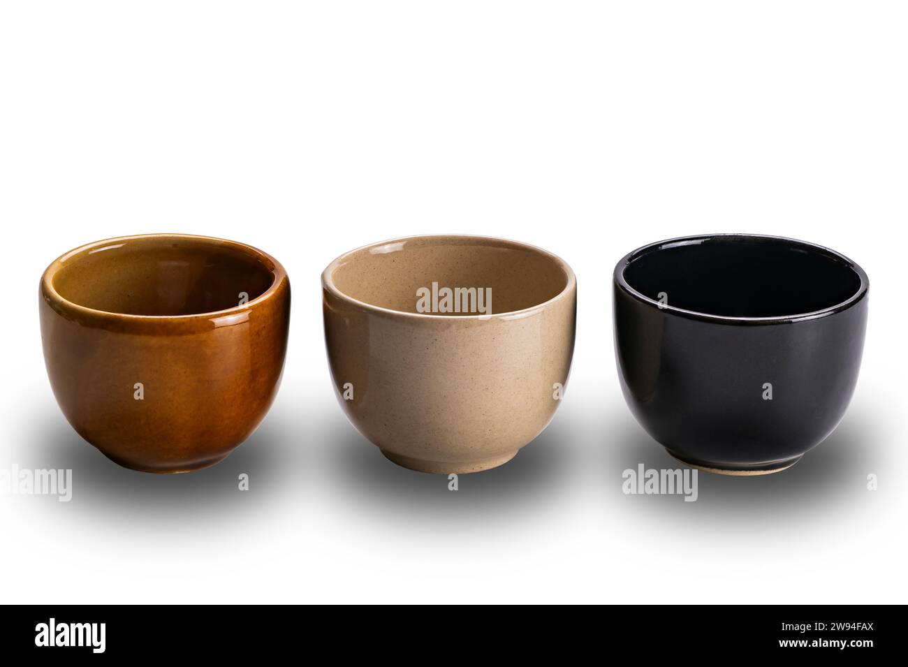 High angle view of different color cups isolated on white background ...