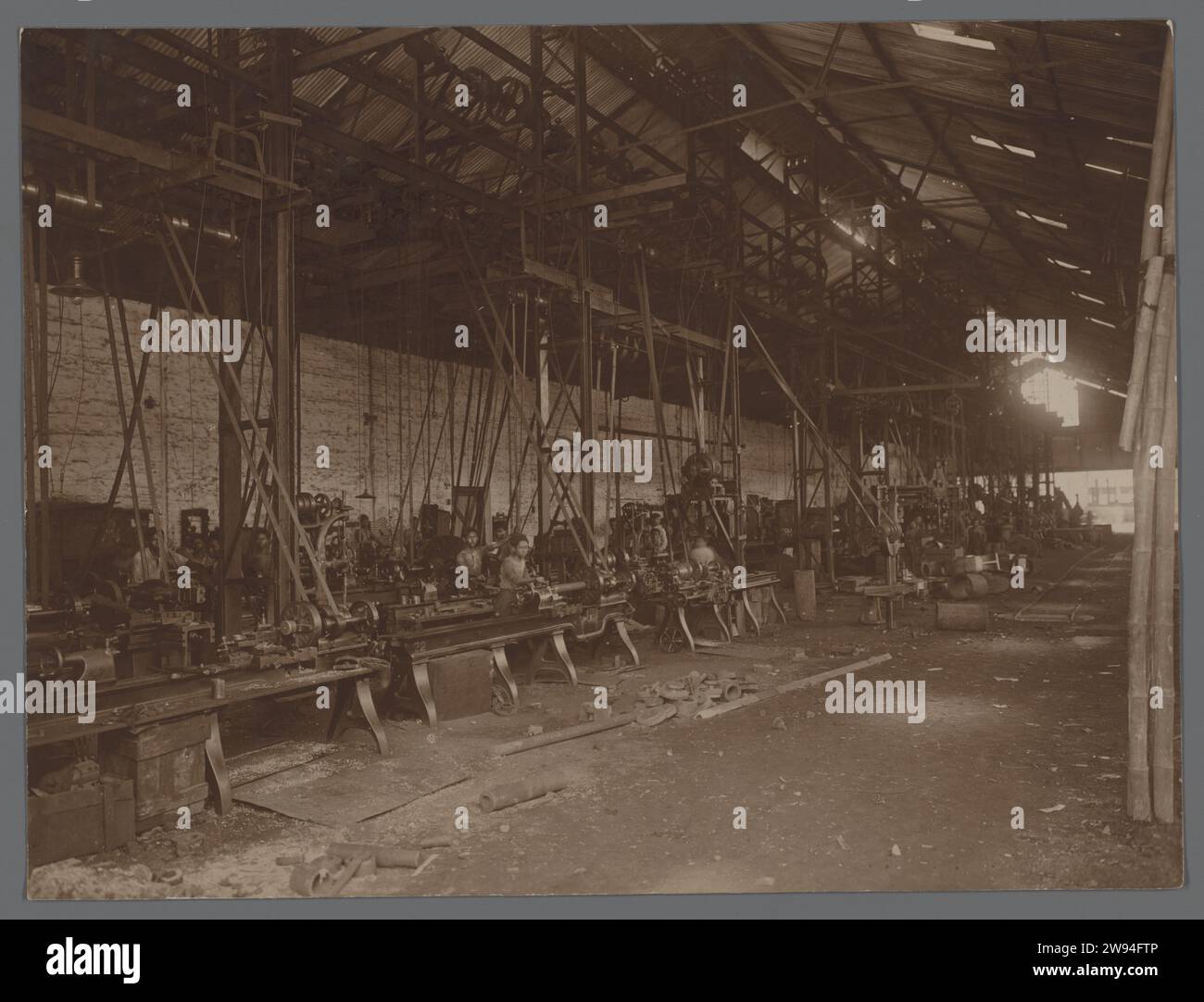First turning, Anonymous, 1908 photograph Face in the factory hall with ...