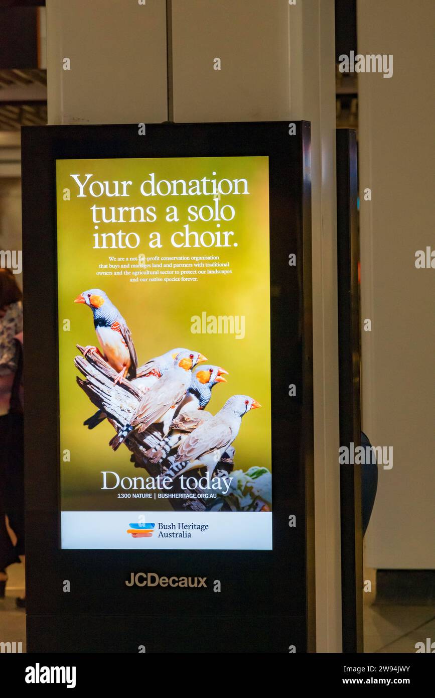 A JC Decaux electronic advertising sign inside Wynyard Railway Station ...