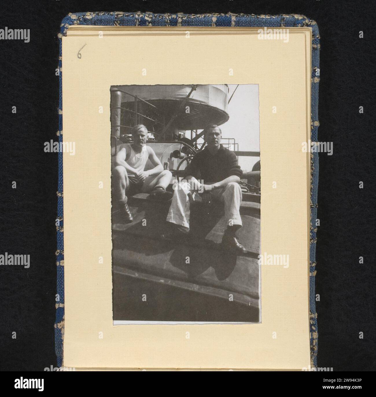 On deck, Anonymous, 1940 - 1943 photograph Two German sailors sitting ...