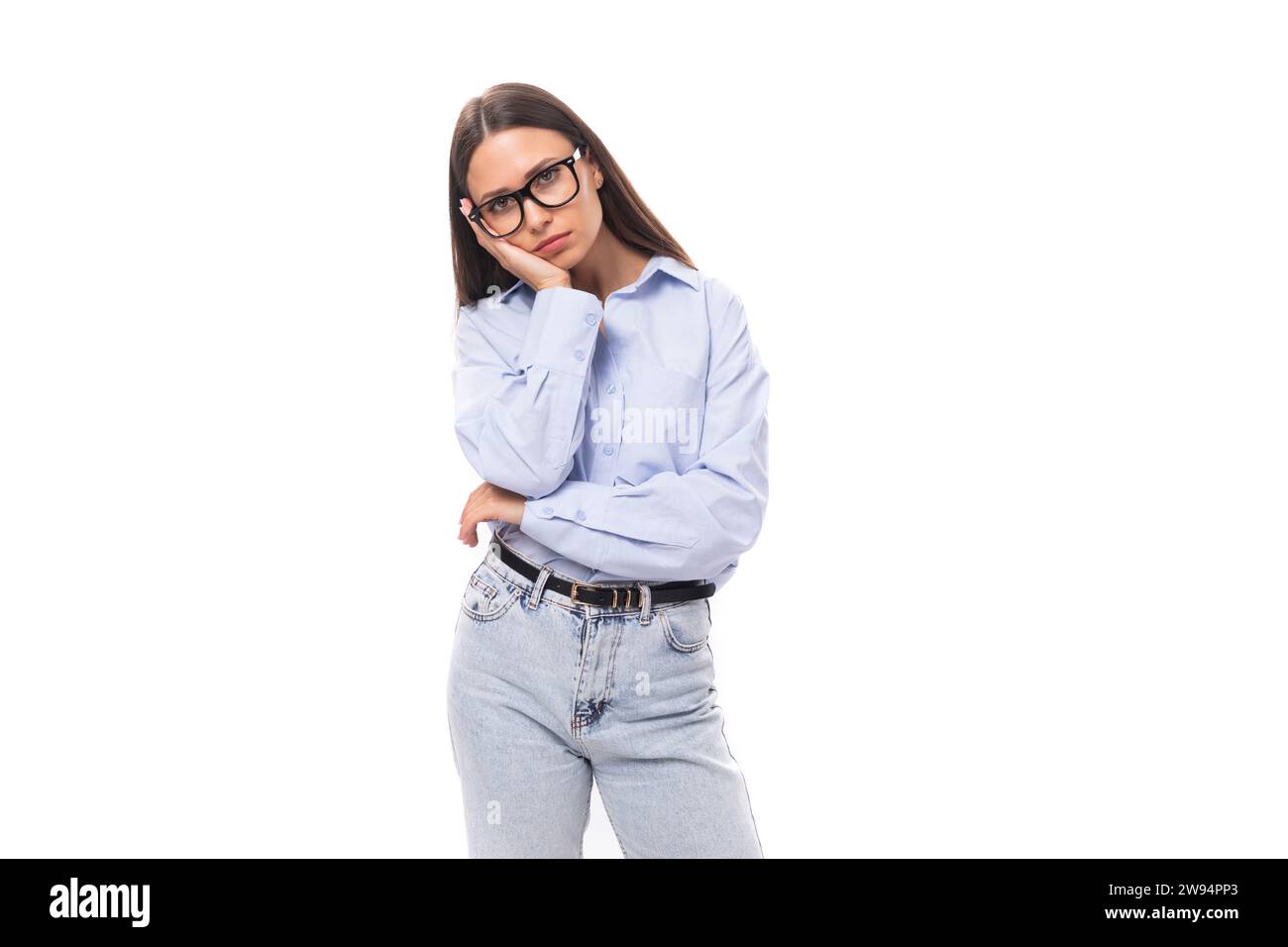 young caucasian model woman with dark straight hair dressed in a blue ...