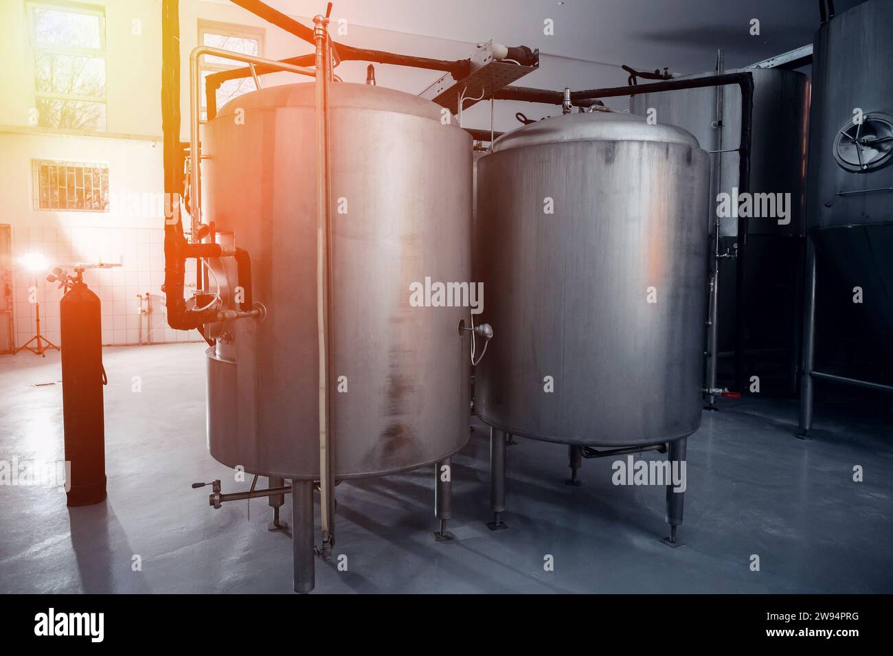 equipment for beer production at a modern factory brewery Stock Photo ...
