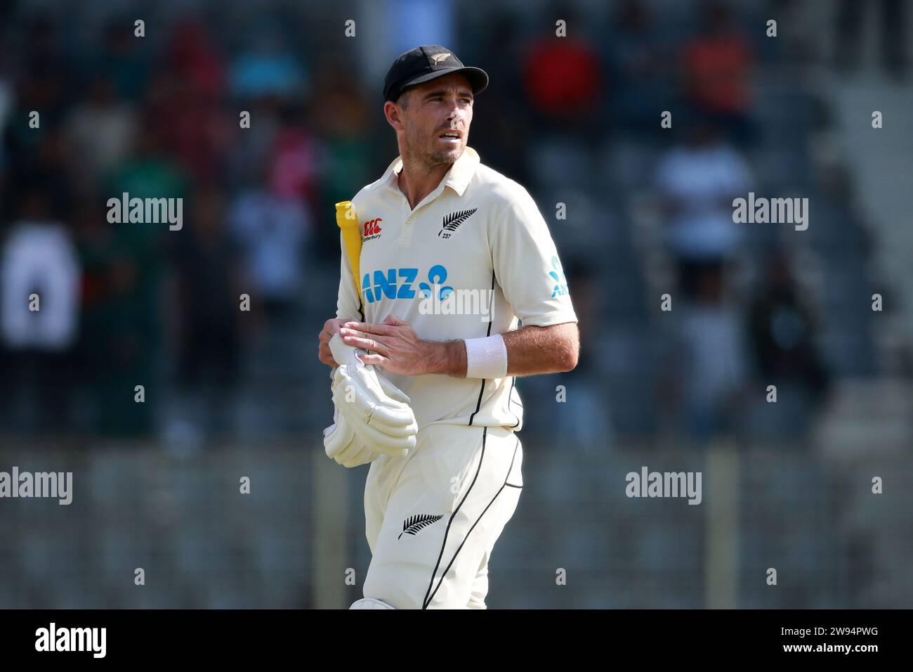 New Zealand captain Tim Southee walks on after dismisal by Taijul Islam ...