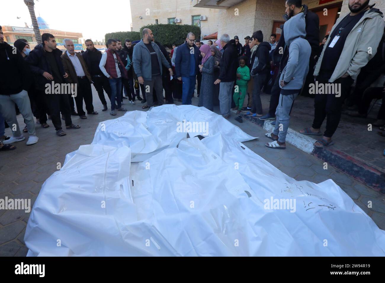 Relatives of the Palestinians died in Israeli attacks, mourn as they ...