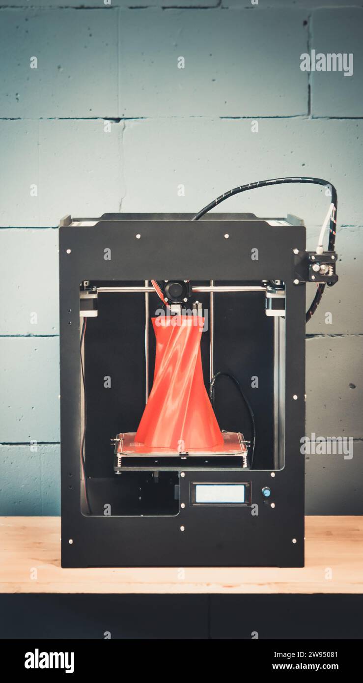 3D printer working close up. Automatic three dimensional 3d printer ...