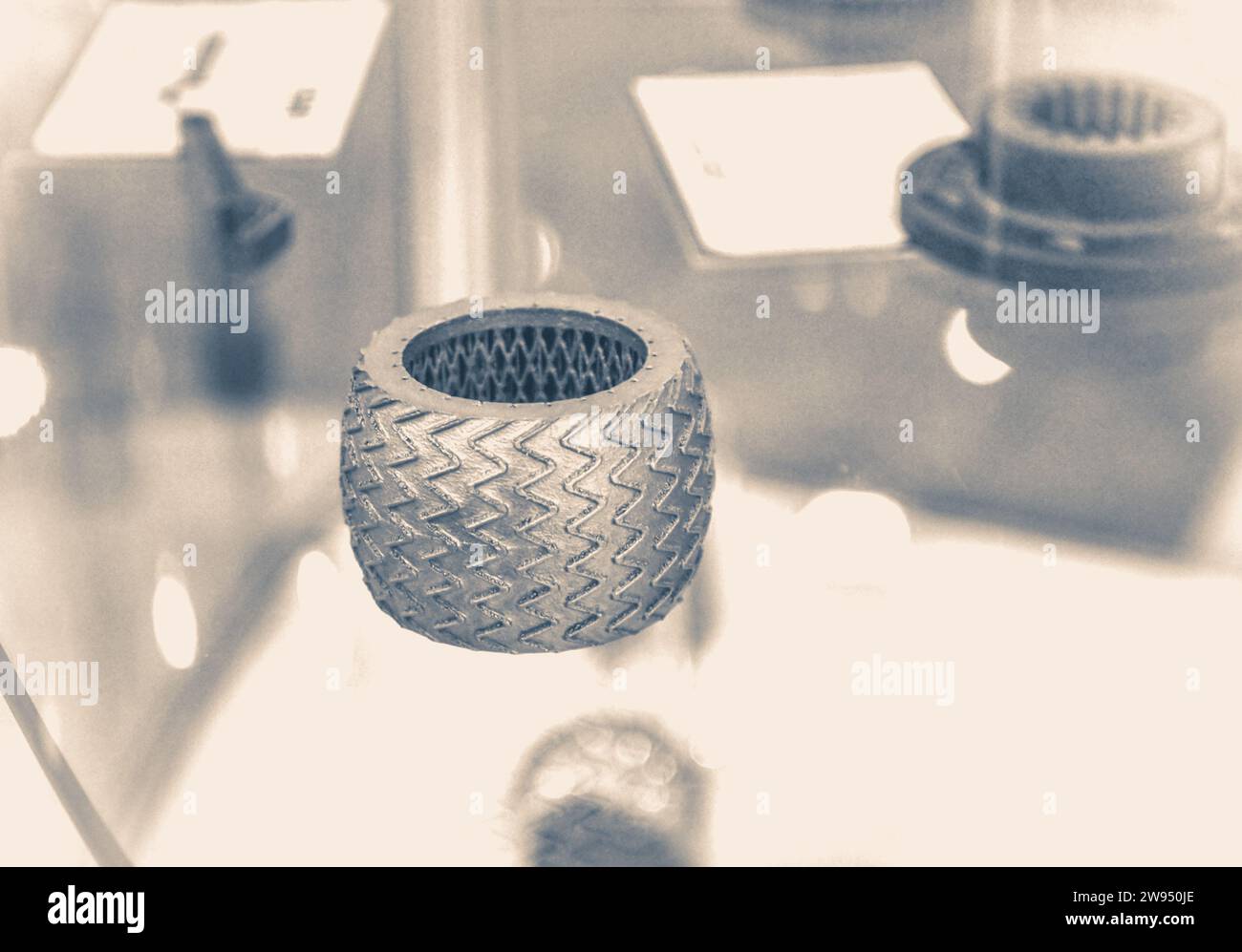 Photo in old vintage style. Selective Laser Melting. Object printed on ...