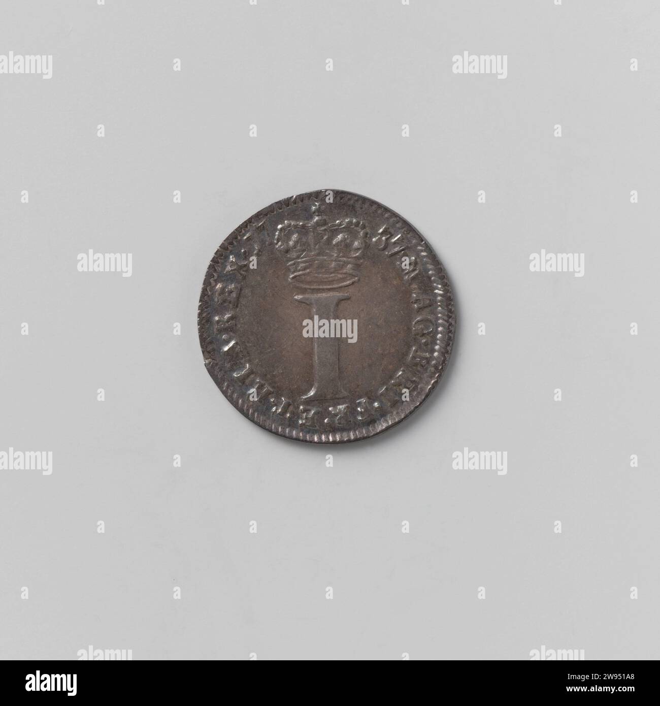 Penny from England of George II, 1737 ,, 1737 coin Silver coin. Front ...