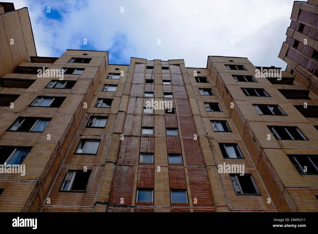 Facade of a multi-storey residential building. Abandoned building in ...