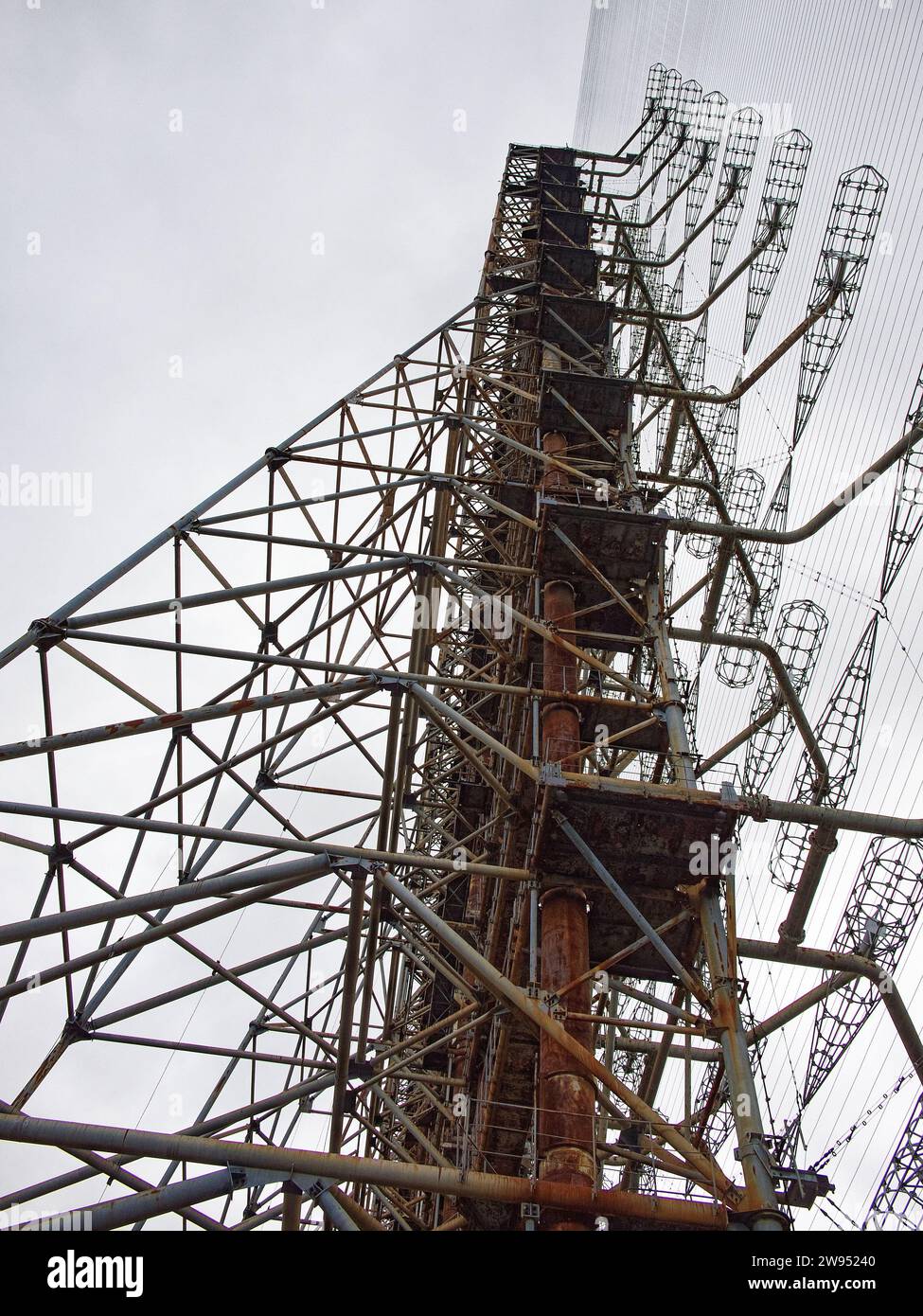 Complex wire networks enveloping rusted metal structures. Duga is a ...