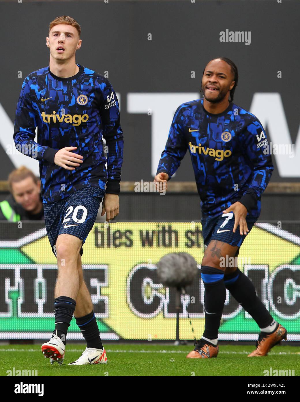 Wolverhampton, UK. 24th Dec, 2023. Cole Palmer of Chelsea and Raheem ...