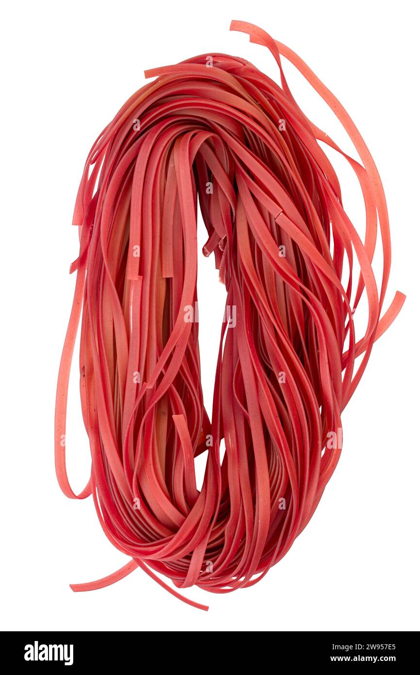 Homemade egg pasta tagliatelle with the addition of beet. Raw nest ...