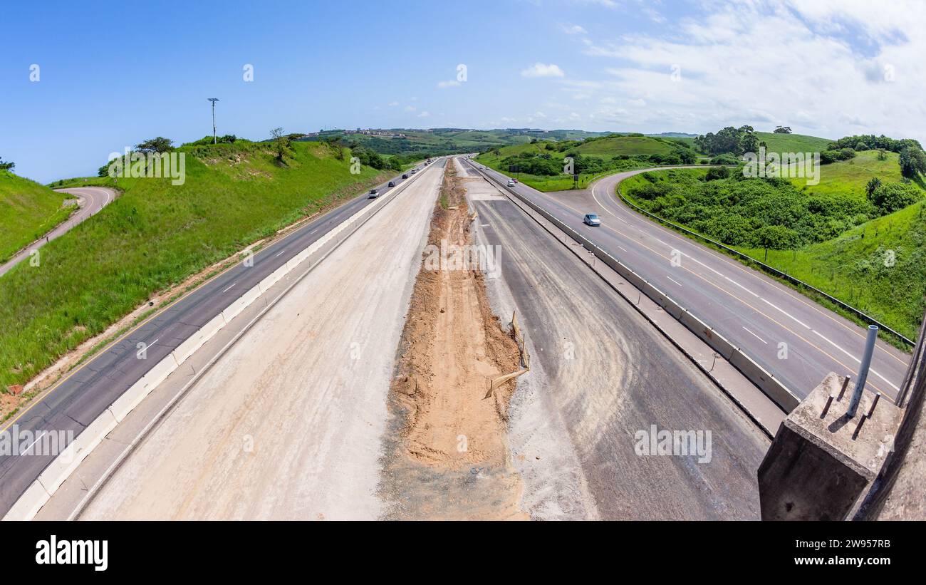 Driving road highway through construction expansion improvements with ...