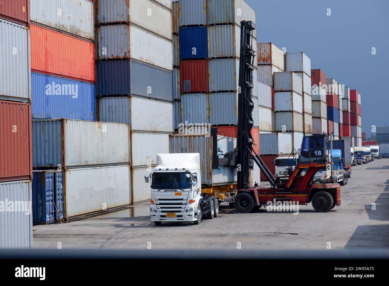 Container forklift on the wharf international transport logistics Stock ...