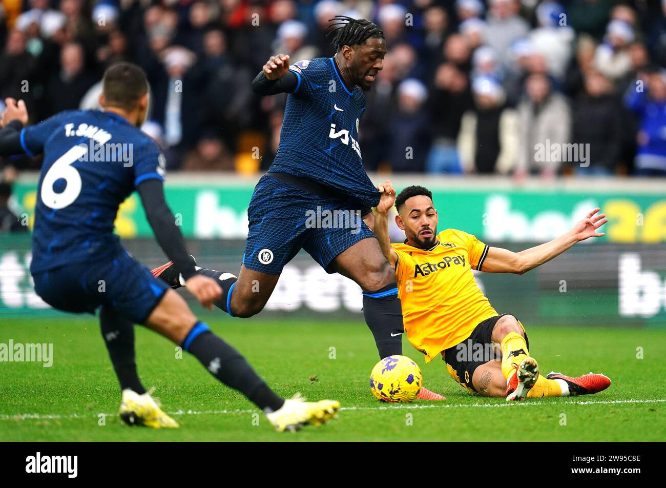 Chelsea's Axel Disasi (left) and Wolverhampton Wanderers' Matheus Cunha ...