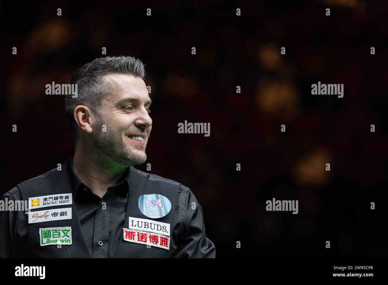 Macao, China. 24th Dec, 2023. Mark Selby of England reacts while ...