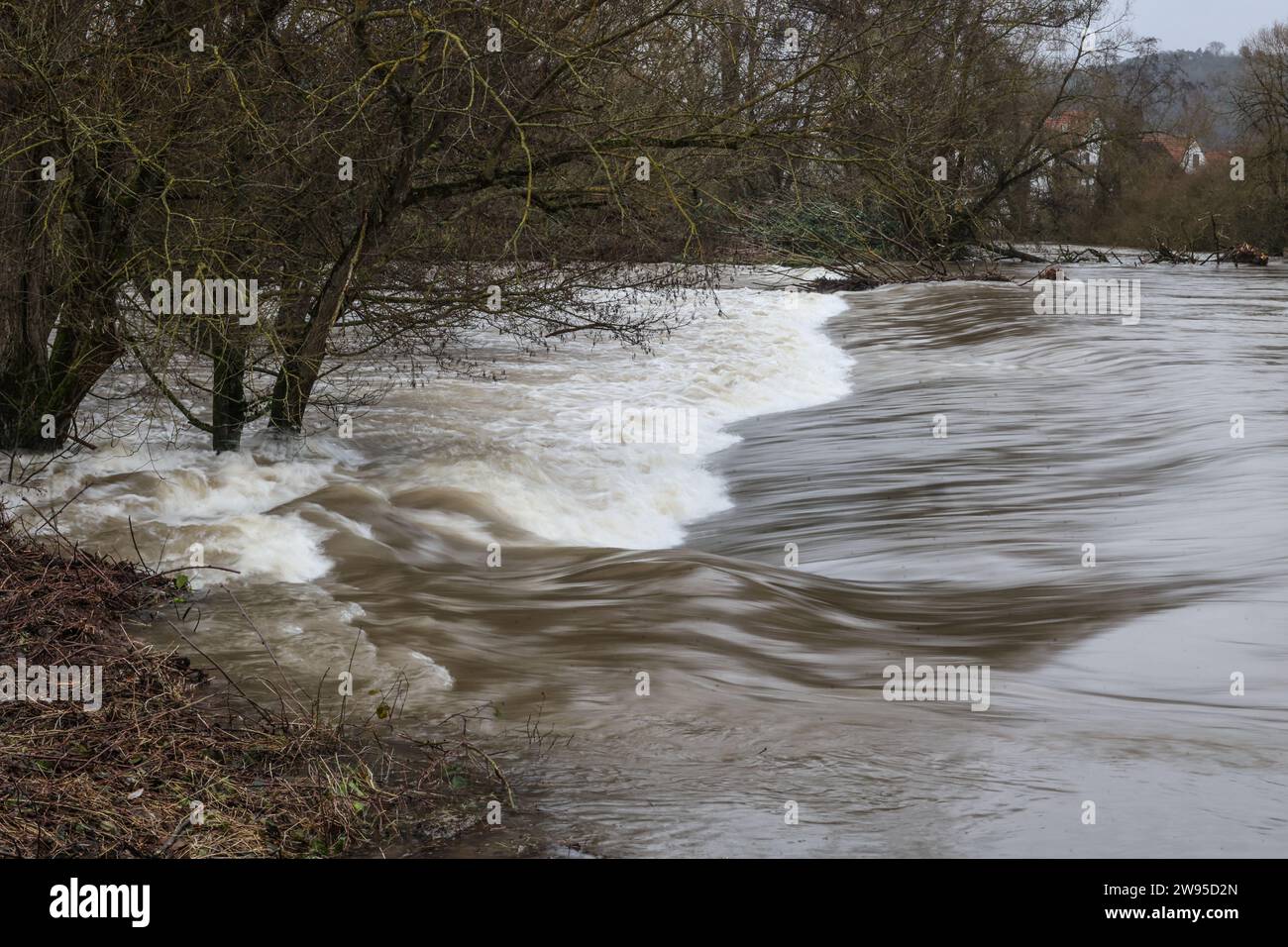 Roth, Germany. 24th Dec, 2023. The Lahn has burst its banks. After ...