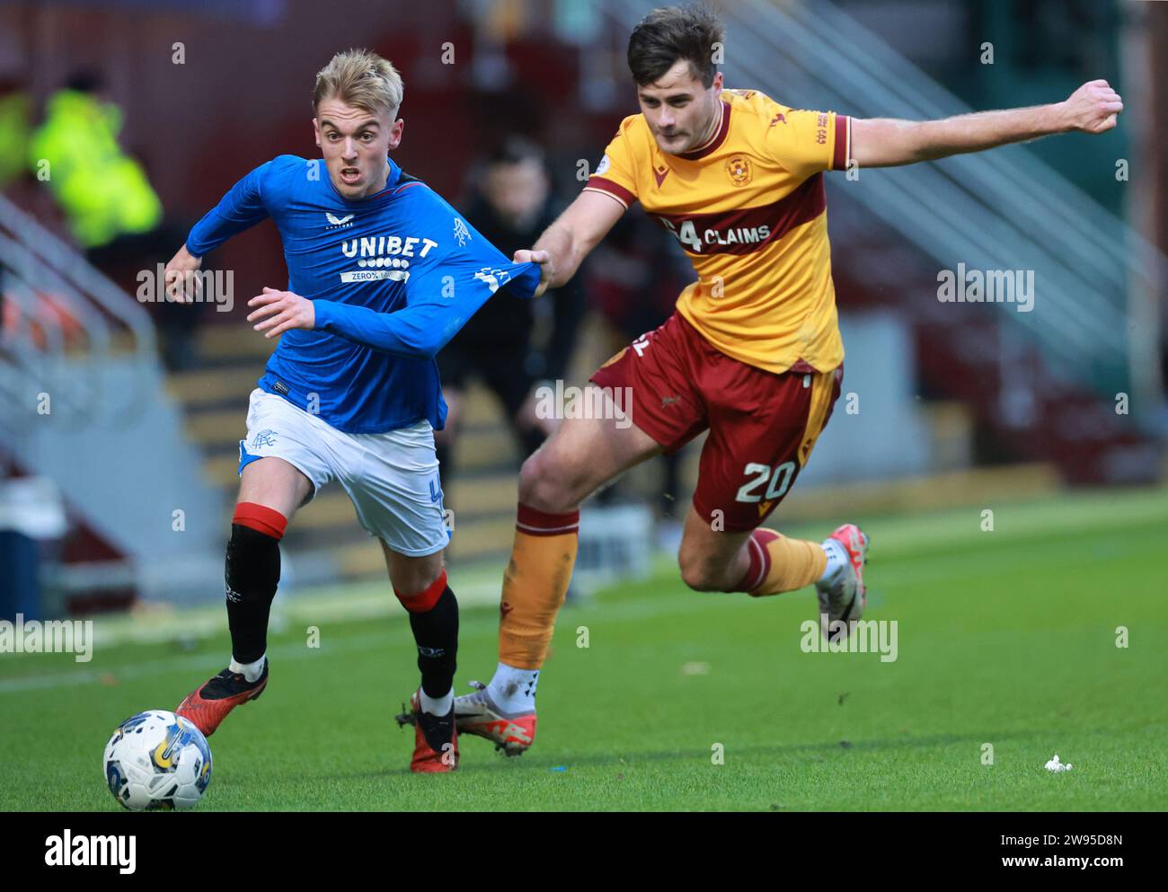 Rangers' Ross McCausland (left) and Motherwell’s Shane Blaney battle ...