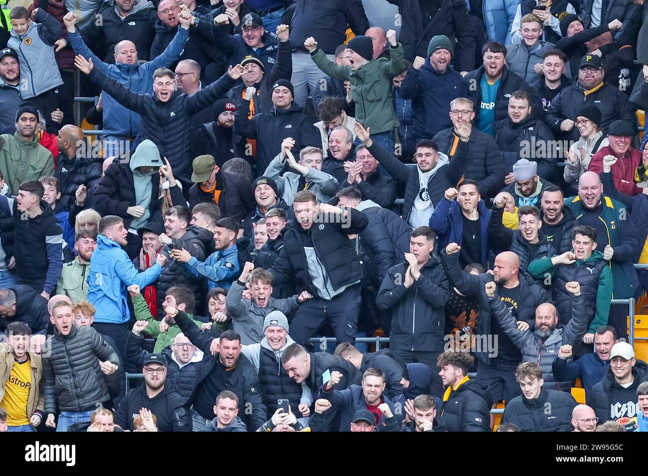 Wolverhampton, UK. 24th Dec, 2023. Wolves' fans applaud and celebrate ...
