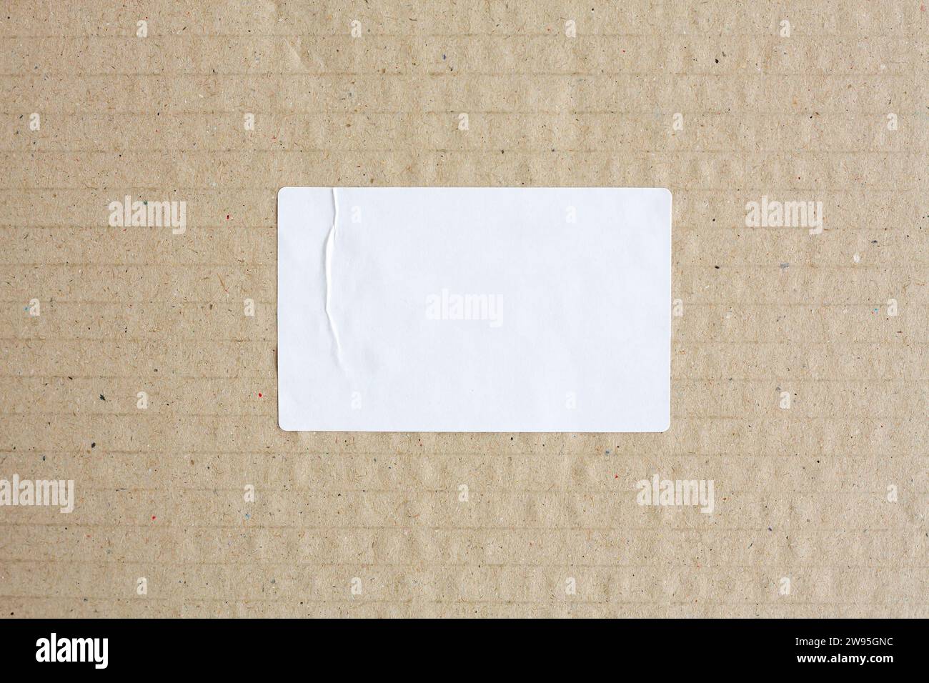 Stickers label on cardboard paper background Stock Photo - Alamy