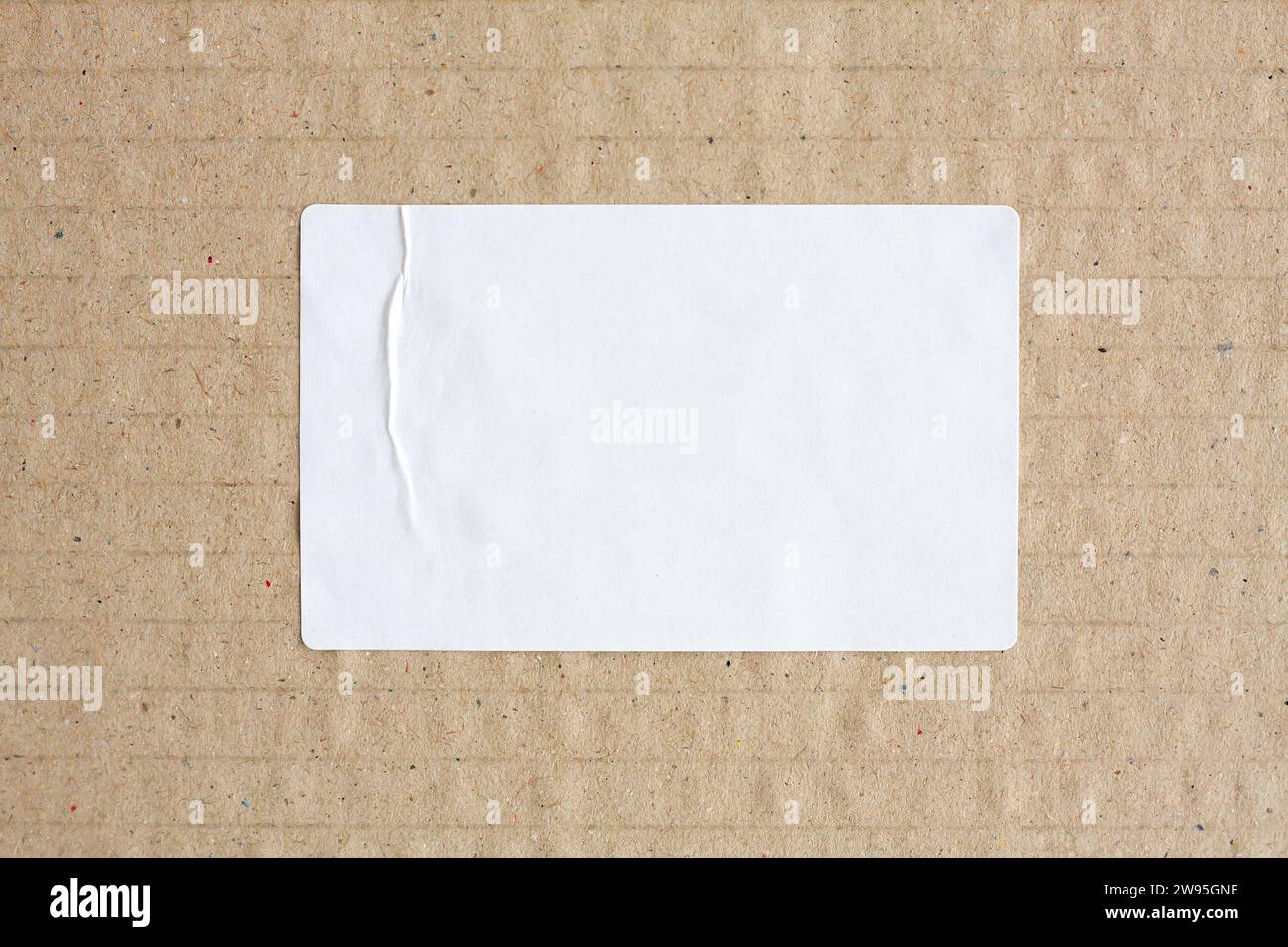 Stickers label on cardboard paper background Stock Photo - Alamy